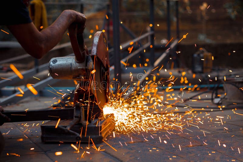 A Worker Cutting Metal with Grinder Stock Image - Image of angle ...