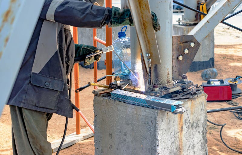 Worker Cutting Metal Plate by Gas Cutting Torch at a Construction Site ...