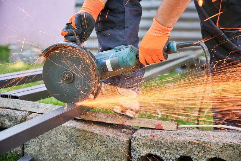 Worker Cutting Metal Pole in Construction Zone Stock Image - Image of ...