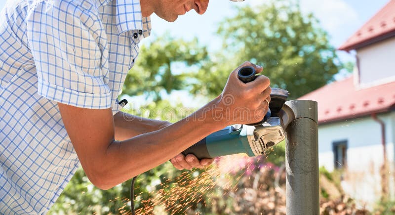 Worker Cutting Metal Pole for Solar Panels Stock Image - Image of ...