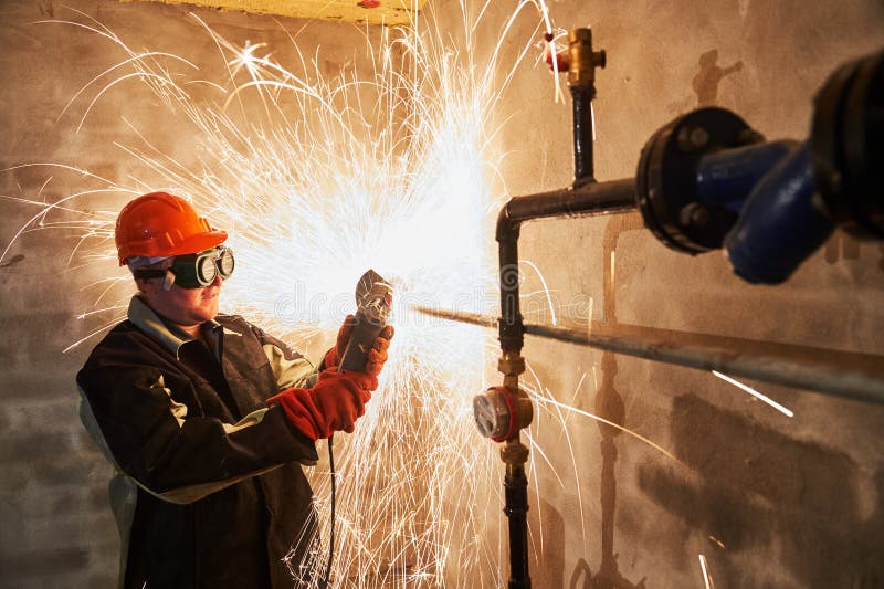Worker Cutting Pipe with Sparks by Grinder Flame Torch Cutter Stock ...