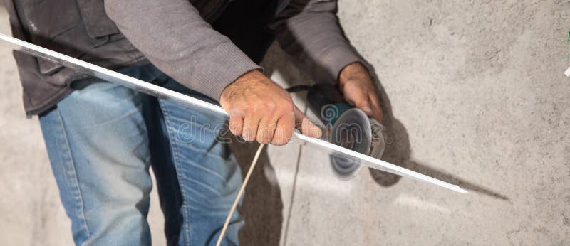 Worker Cutting Plastic Panel. Repairing Ceiling Stock Photo - Image of ...