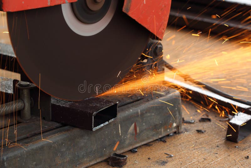 Worker cutting steel rod stock image. Image of manufacture - 42204433