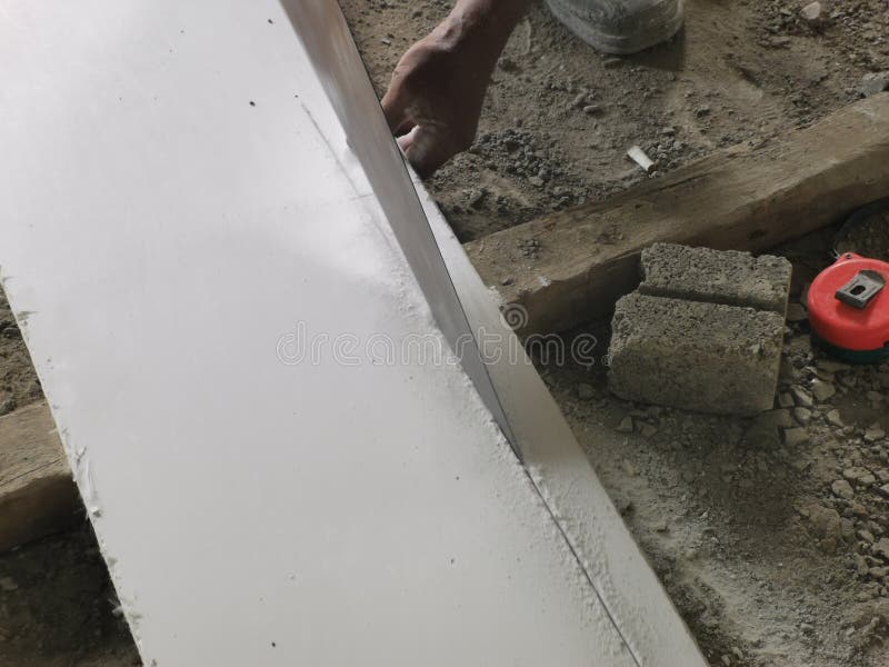 Worker Cutting a White Standard Plaster Ceiling Board Panel. Stock ...