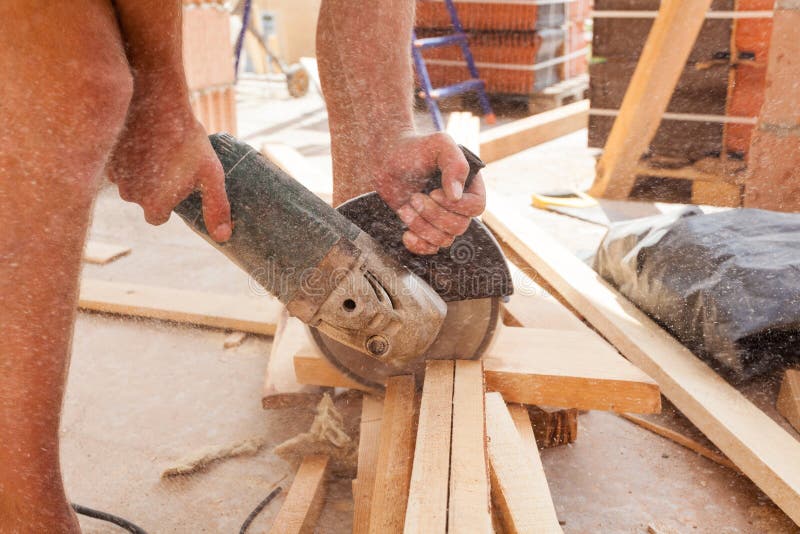 Worker Cutting Wood with Angle Grinder. Stock Image - Image of danger ...