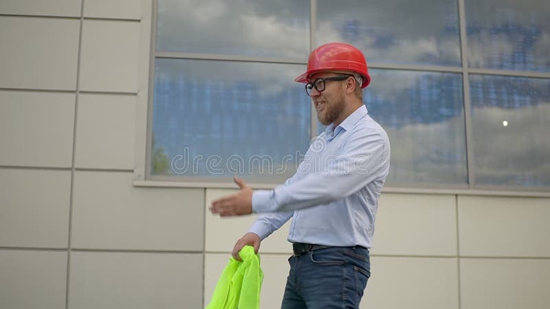 A Worker Dances at a Construction Site Stock Footage - Video of ...
