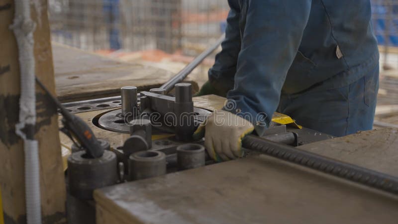 Worker in Dark Uniform Uses Specialized Bending Machine Stock Footage ...