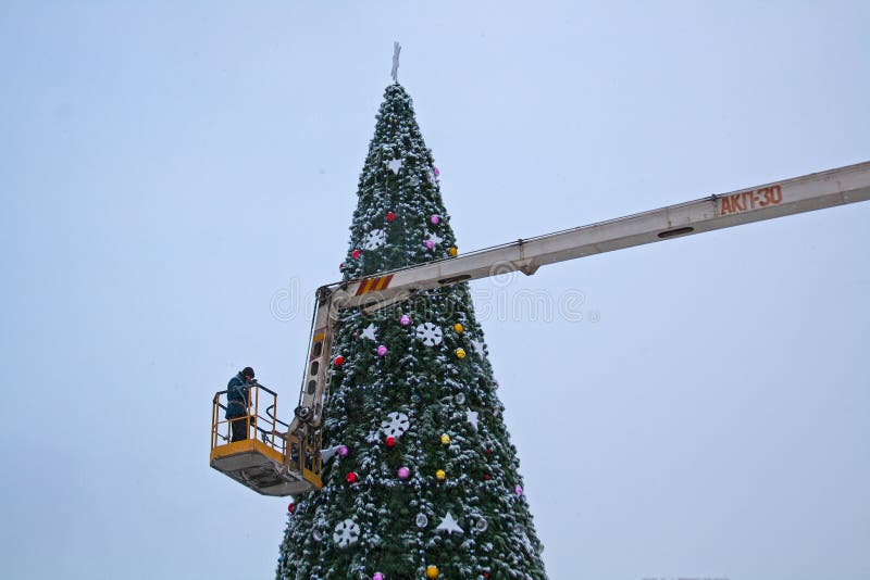 A Worker Decorates a Christmas Tree in Volgograd Editorial Image ...