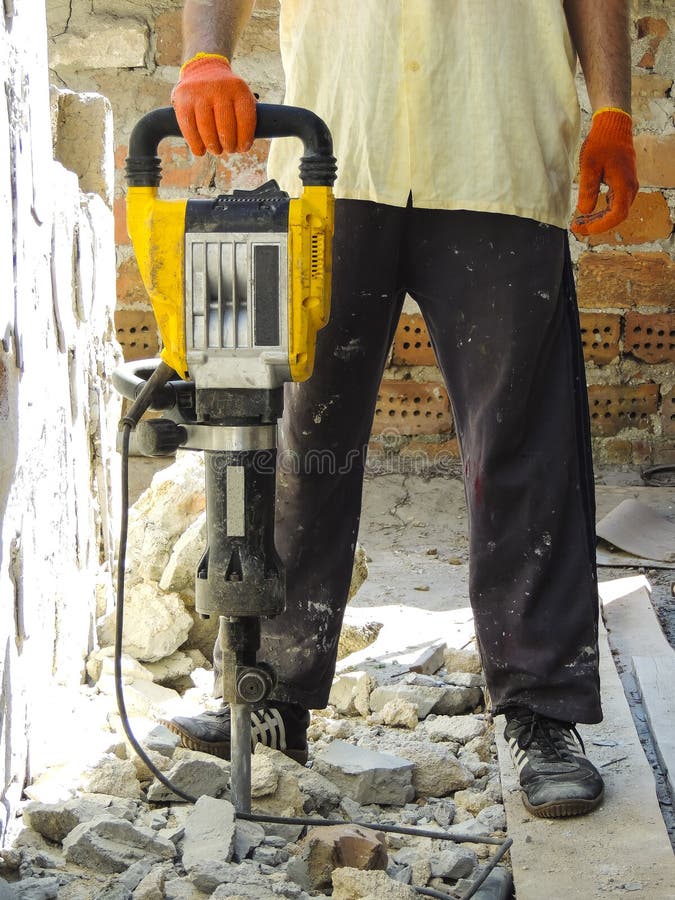 Worker with Demolition Hammer Breaking Interior Wall Stock Image ...
