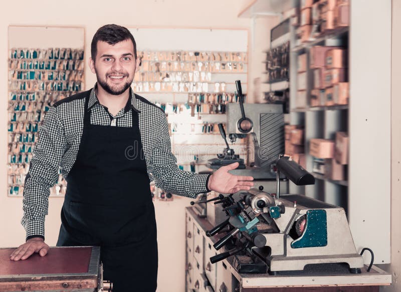 Worker Demonstrating Tools for Making Keys Stock Photo - Image of ...