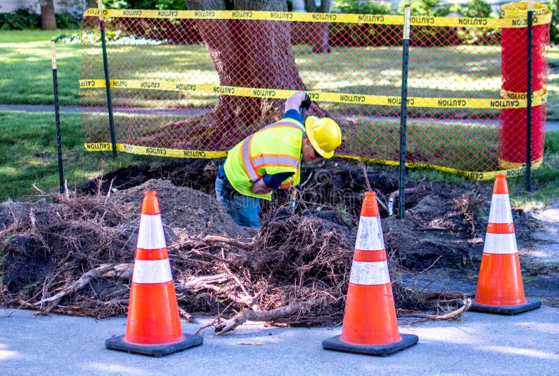 Worker Digging at a Job Site Editorial Photography - Image of michigan ...