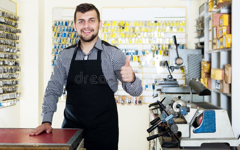 Worker Displaying His Tools for Making Keys Stock Photo - Image of ...