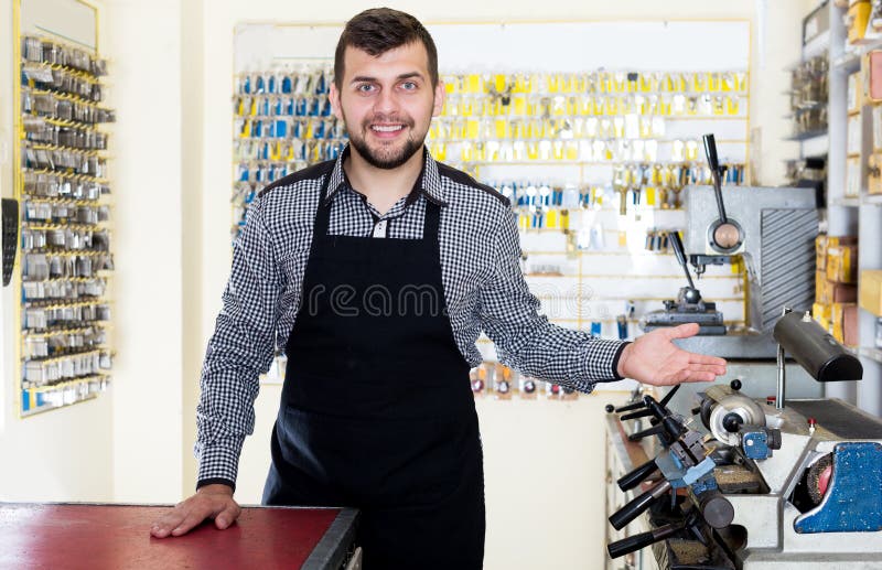 Worker Displaying His Tools for Making Keys Stock Photo - Image of ...