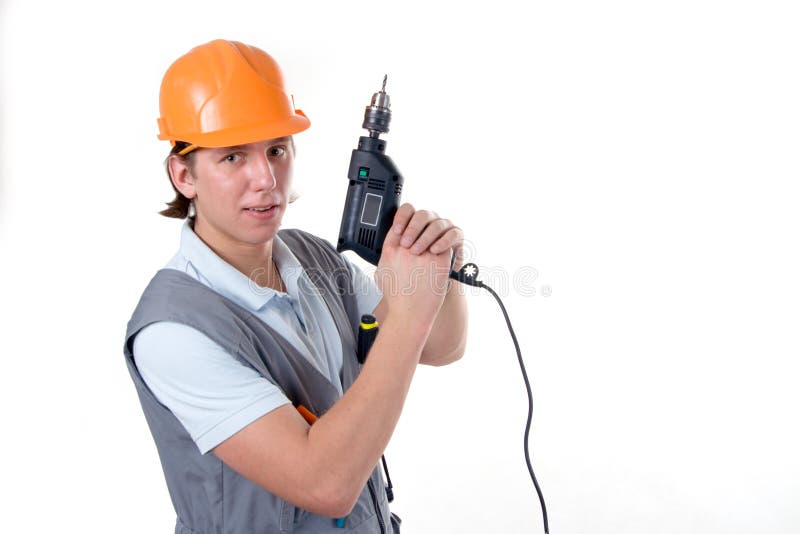 Worker with drill stock image. Image of electrician, helmet - 4546531