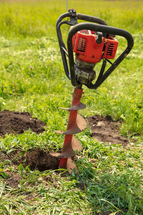Worker Drills the Ground at the Construction Site Stock Photo - Image ...