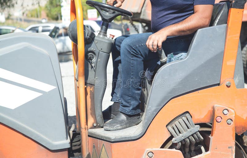 Worker Driving Asphalt Machine. Road Construction Stock Image - Image ...