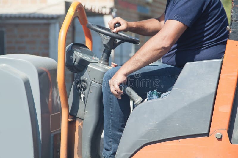 Worker Driving Asphalt Machine. Road Construction Stock Photo - Image ...