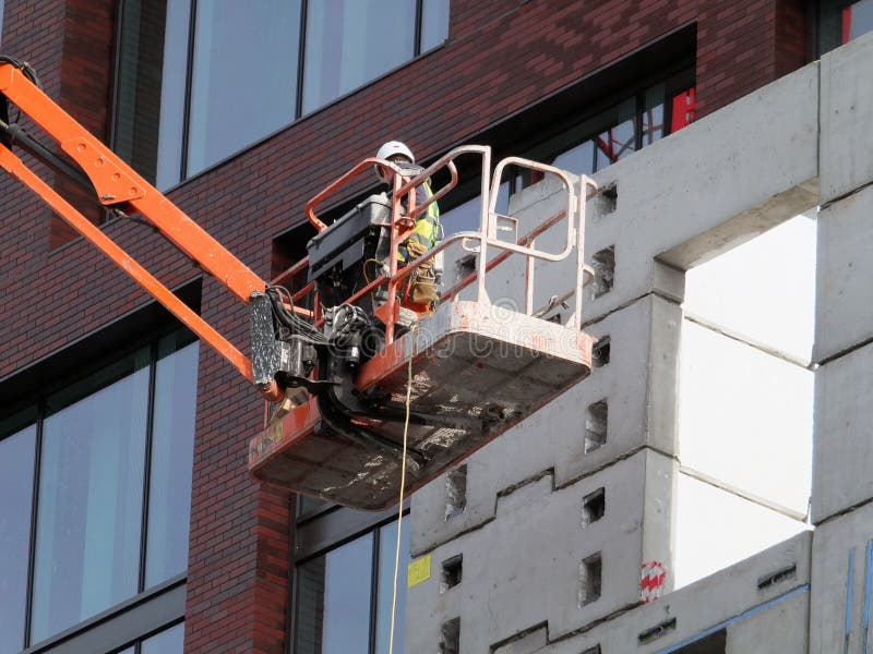 Worker on an Elevated Construction Platform Stock Image - Image of ...