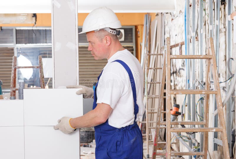 Worker Engaged in Wall Tiling Work Stock Photo - Image of dividing ...