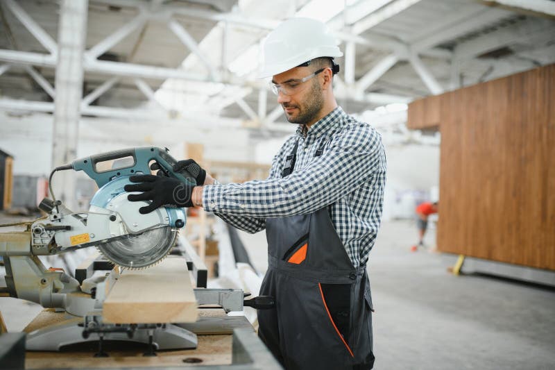 A Worker or Engineer in a Uniform Works on a Construction Site for the ...
