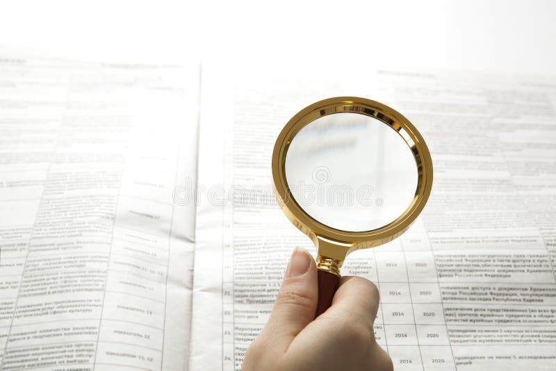 Worker Examines a Magnifying Glass Text Stock Photo - Image of outlook ...
