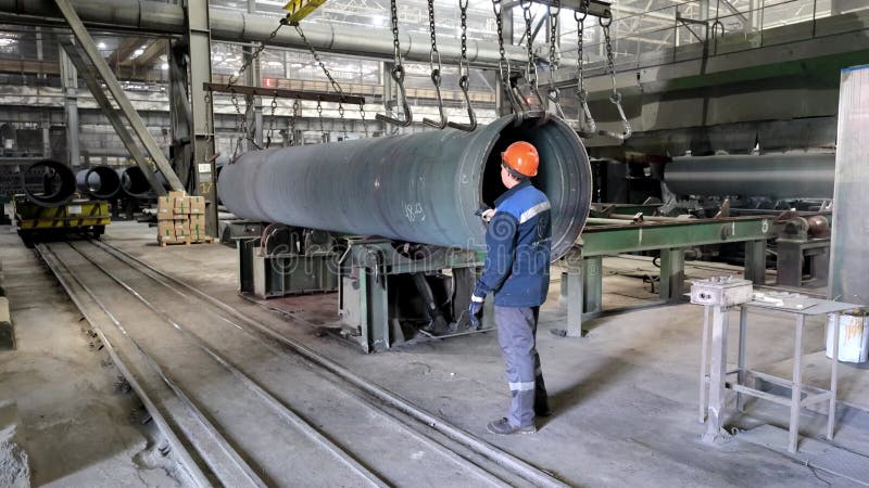 Worker Examines New Cast Iron Pipe in Factory Stock Video - Video of ...