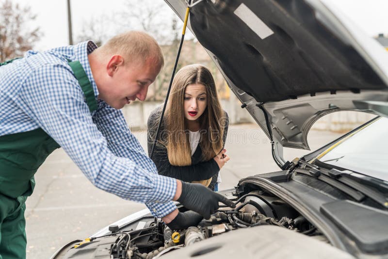 Co-Worker Explaining Something To Confused Team Mate Stock Image ...