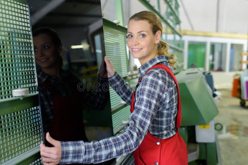 Worker in Factory Carrying Board Stock Photo - Image of line, brazil ...