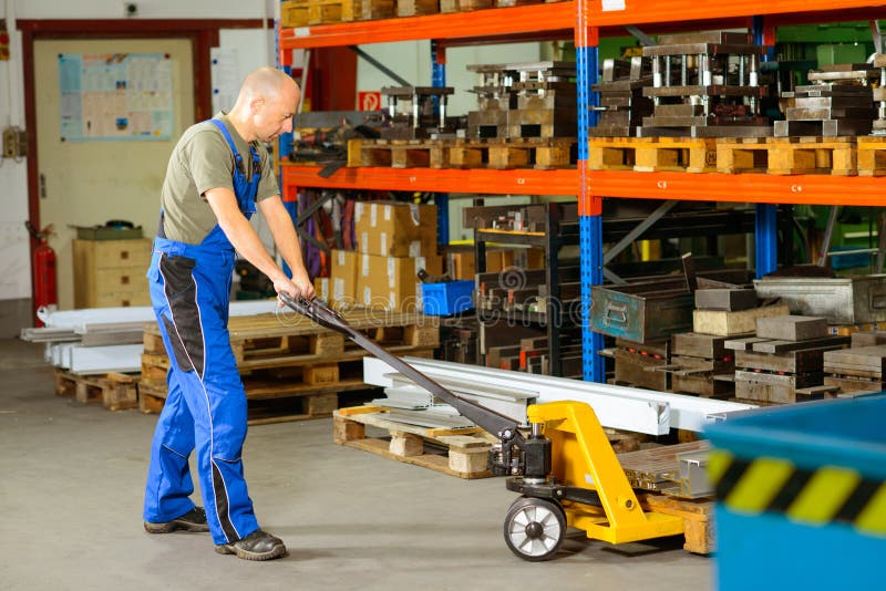 Worker in Factory with Hand Lift Stock Photo - Image of manager ...