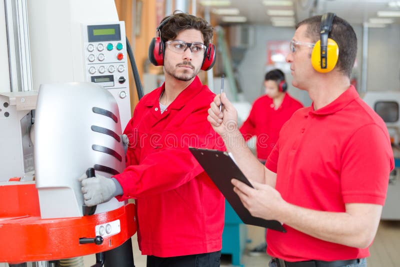 Worker in Factory on Machine Stock Photo - Image of caucasian ...