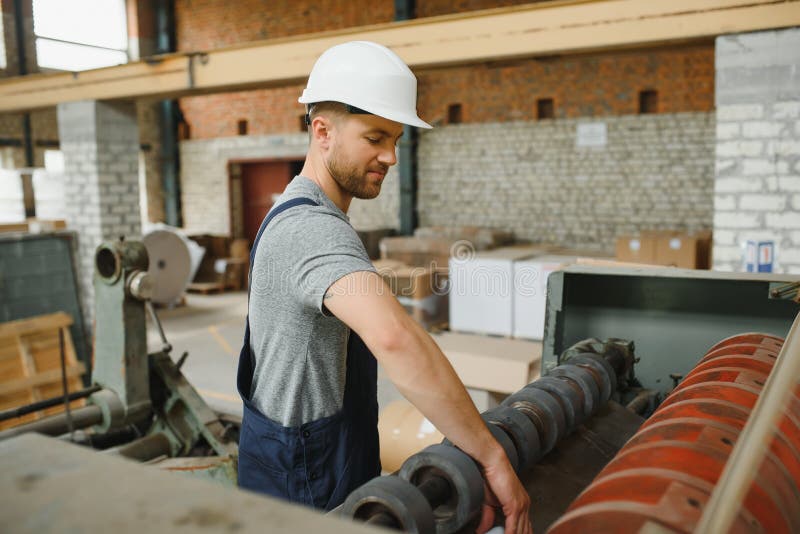 Worker in Factory on the Machine Stock Photo - Image of control ...