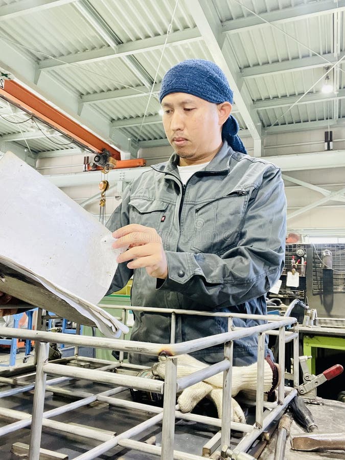 A worker in factory stock photo. Image of face, welding - 295001900