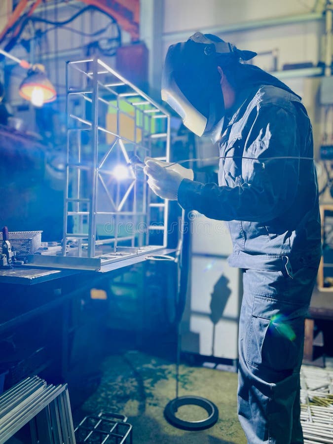 A worker in factory stock image. Image of stainlees - 295005703