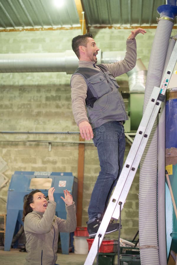 Worker falling off ladder stock photo. Image of injury - 173518498