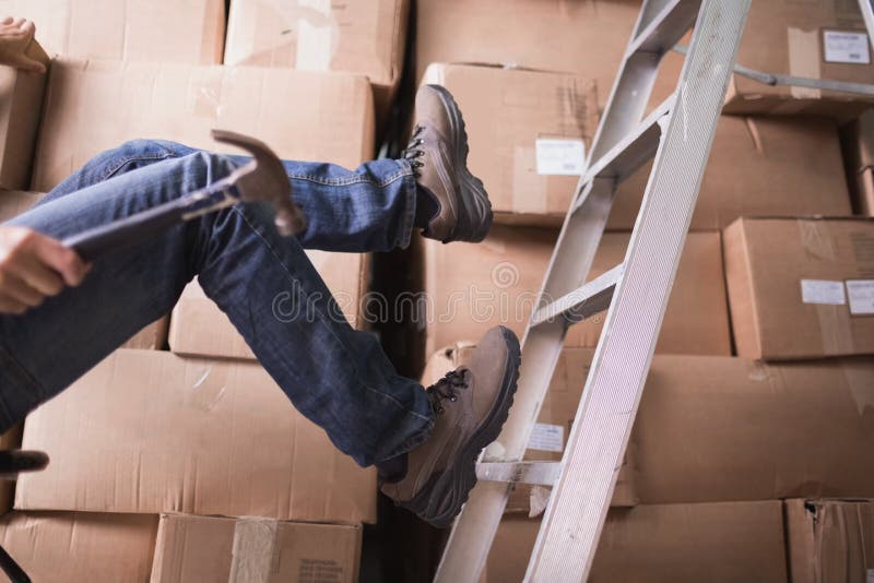 Worker Falling Off Ladder in Warehouse Stock Photo - Image of holding ...
