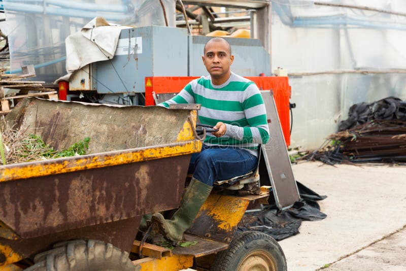 Worker Farmer Working on Tractor Stock Image - Image of scene ...