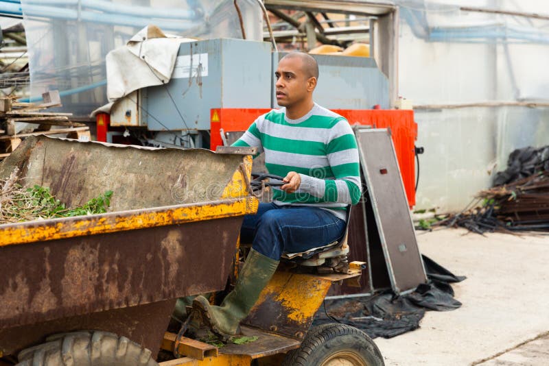 Worker Farmer Working on Tractor Stock Photo - Image of masks, portrait ...