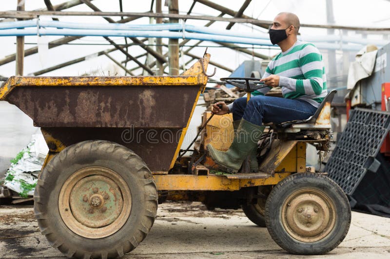 Worker Farmer Working on Tractor Stock Image - Image of busy ...