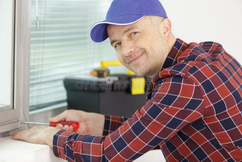 Worker Fasten Handle To Plastic Window Stock Image - Image of repair ...