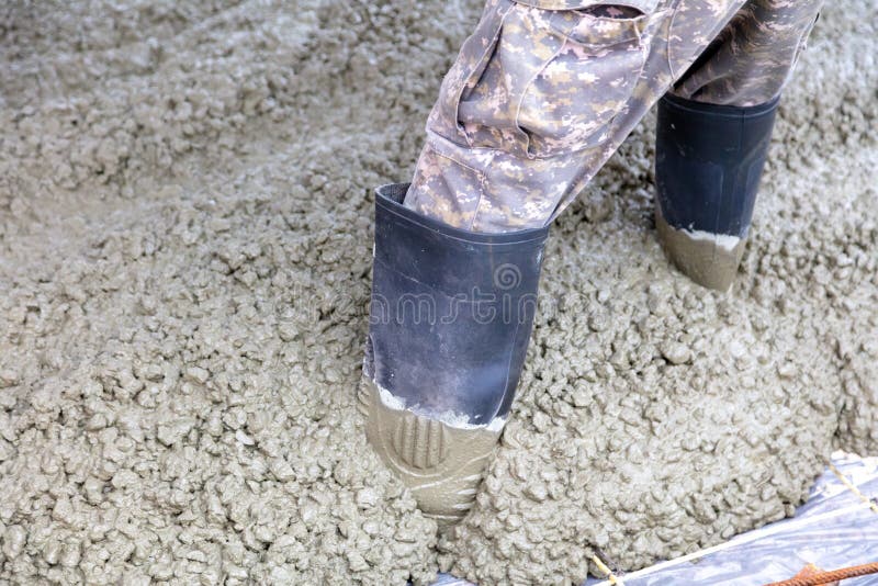 Worker Feet in Concrete Mix Stock Photo - Image of worker, industry ...