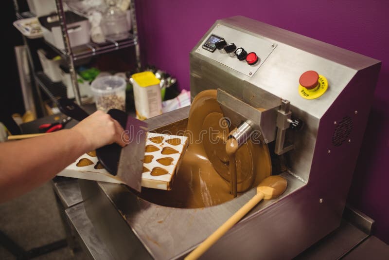 Worker Filling Mould with Melted Chocolate Stock Image - Image of ...