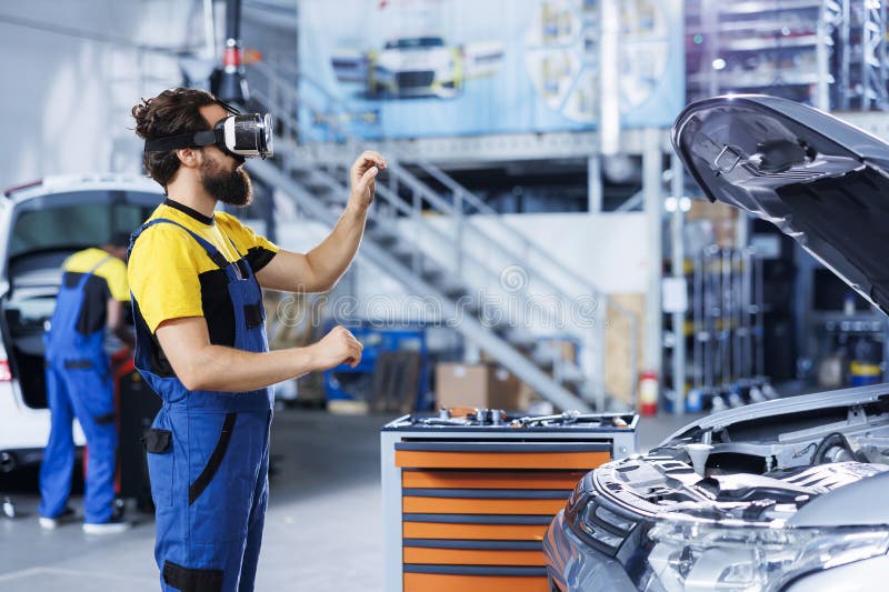 Worker Fixes Malfunctioning Car Using VR Stock Photo - Image of working ...