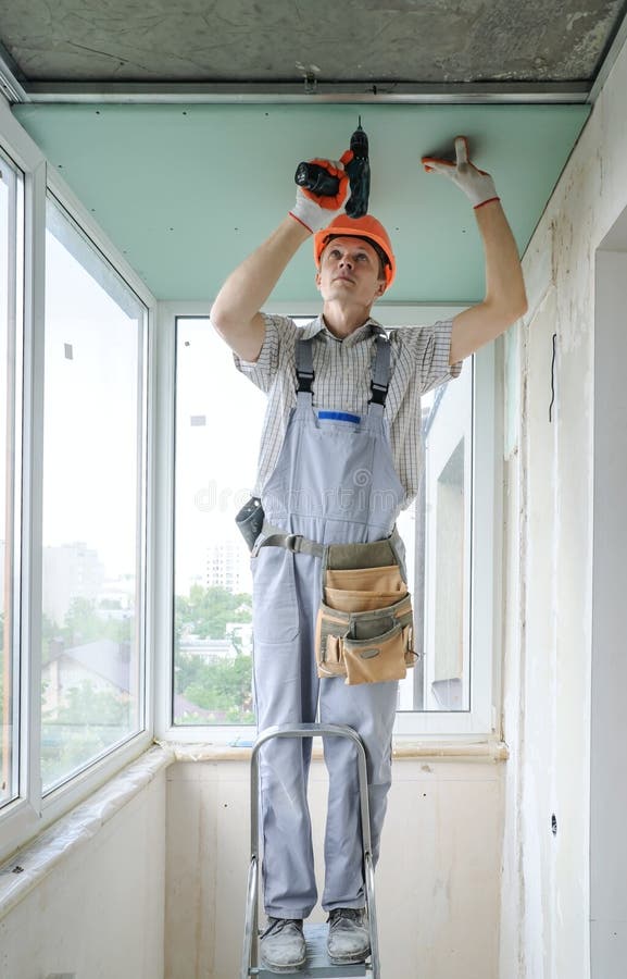 Worker is Fixing the Drywall. Stock Image - Image of drywall ...