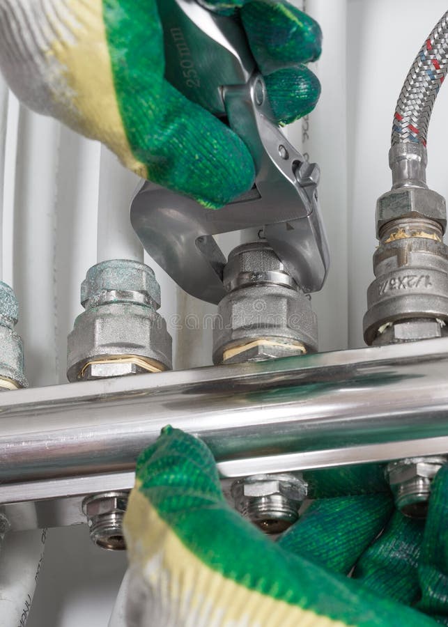 Worker Fixing Heating System Stock Image - Image of construction, pipe ...