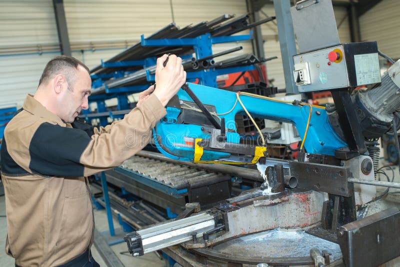 Worker fixing a machine stock photo. Image of work, fixing - 253358966