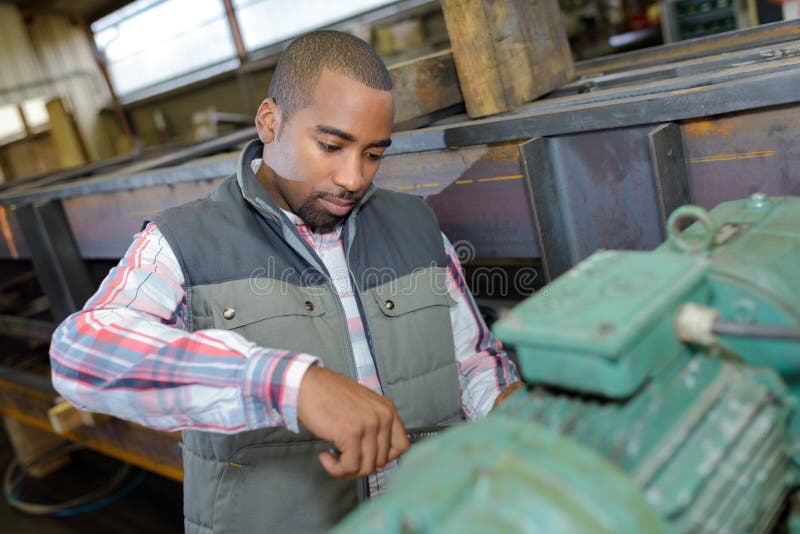 Men fixing motor stock photo. Image of colleague, tender - 174508870