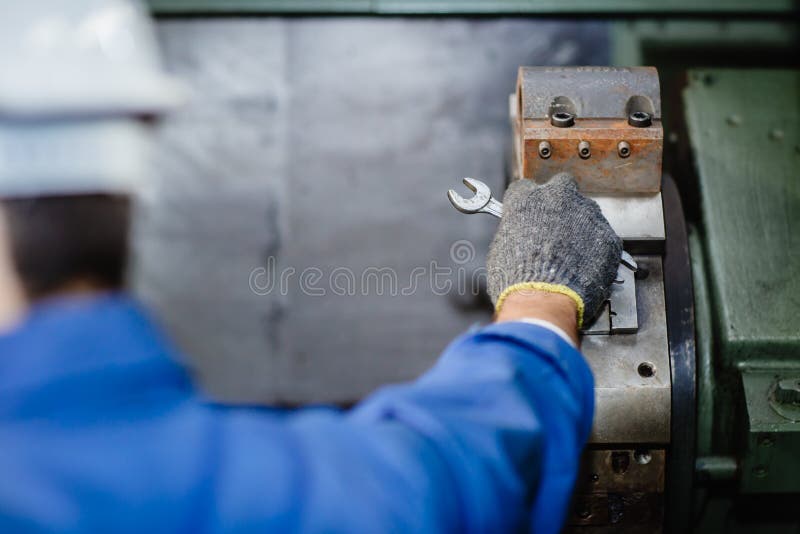 Worker Fixing the Machine with Wrench Stock Image - Image of machinery ...