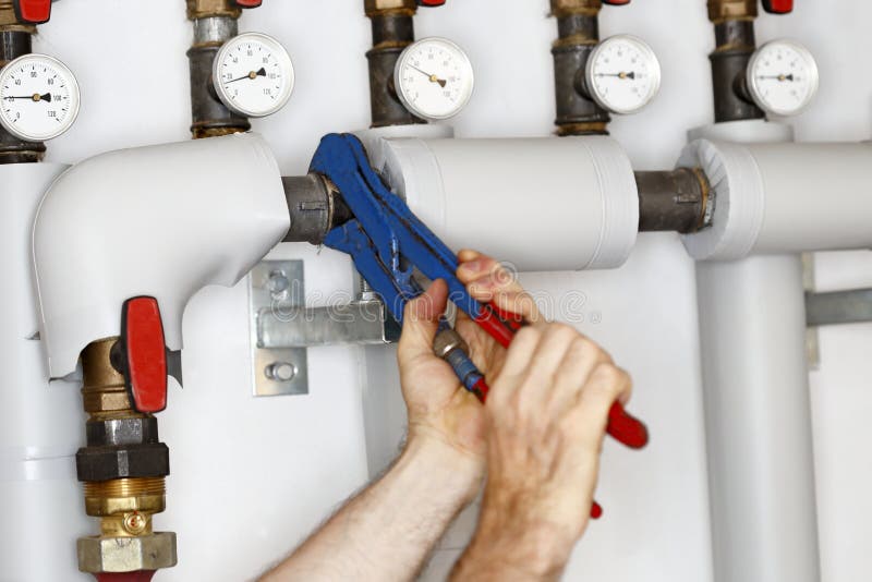 Worker is fixing a pipe stock image. Image of pipe, handyman - 43843023