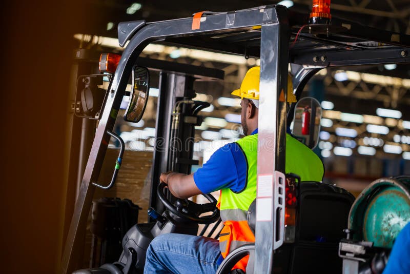 Worker on Forklift, Manual Workers Working in Warehouse, Worker Driver ...