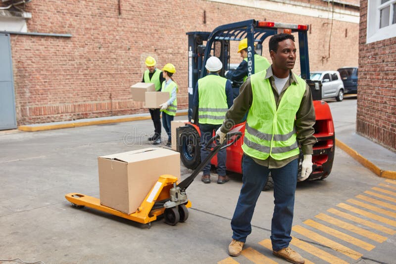 Worker in Front of the Logistics Center with Package Stock Image ...